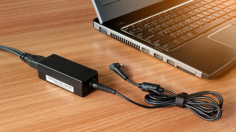 Why do most laptop chargers have a brick?