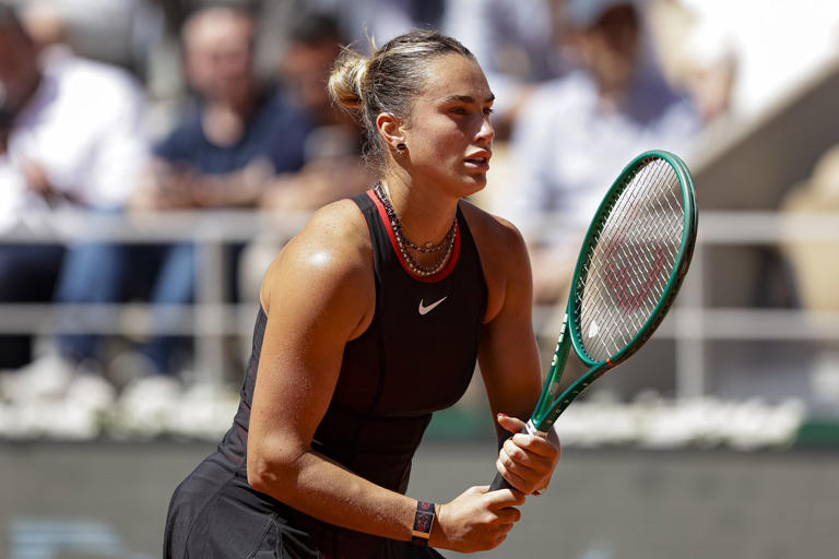 Aryna Sabalenka drips in over 200 carats of diamonds and garnets during ...