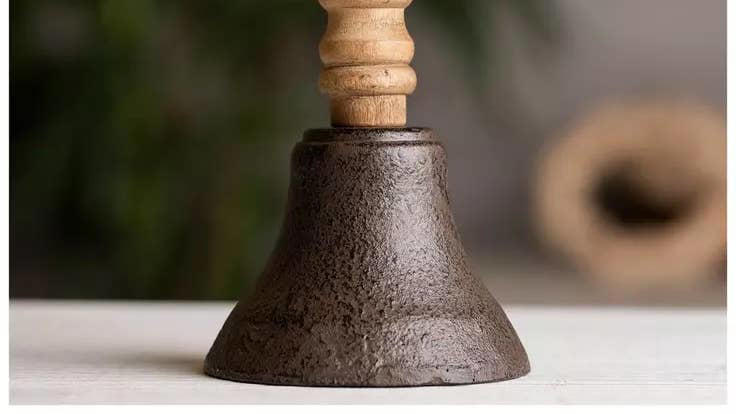 Transform your home with Hobby Lobby's rustic metal bell for $11