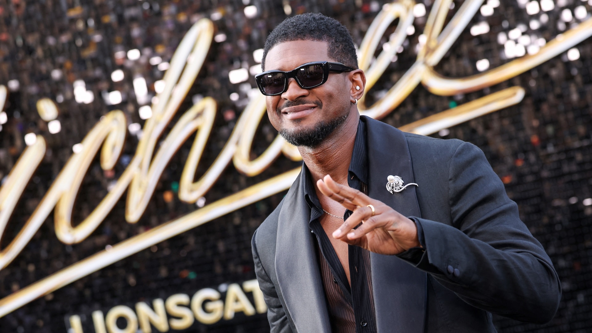 Usher celebrates three of his children graduating: 'Time flies'