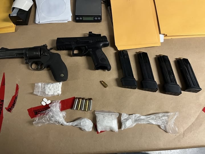 Driver arrested in Salem after guns, drugs found during traffic stop