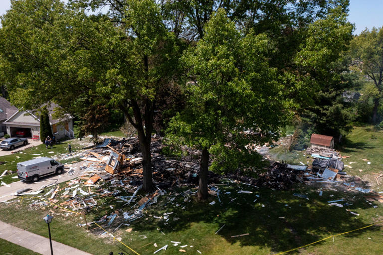 Man missing after house explosion injures woman