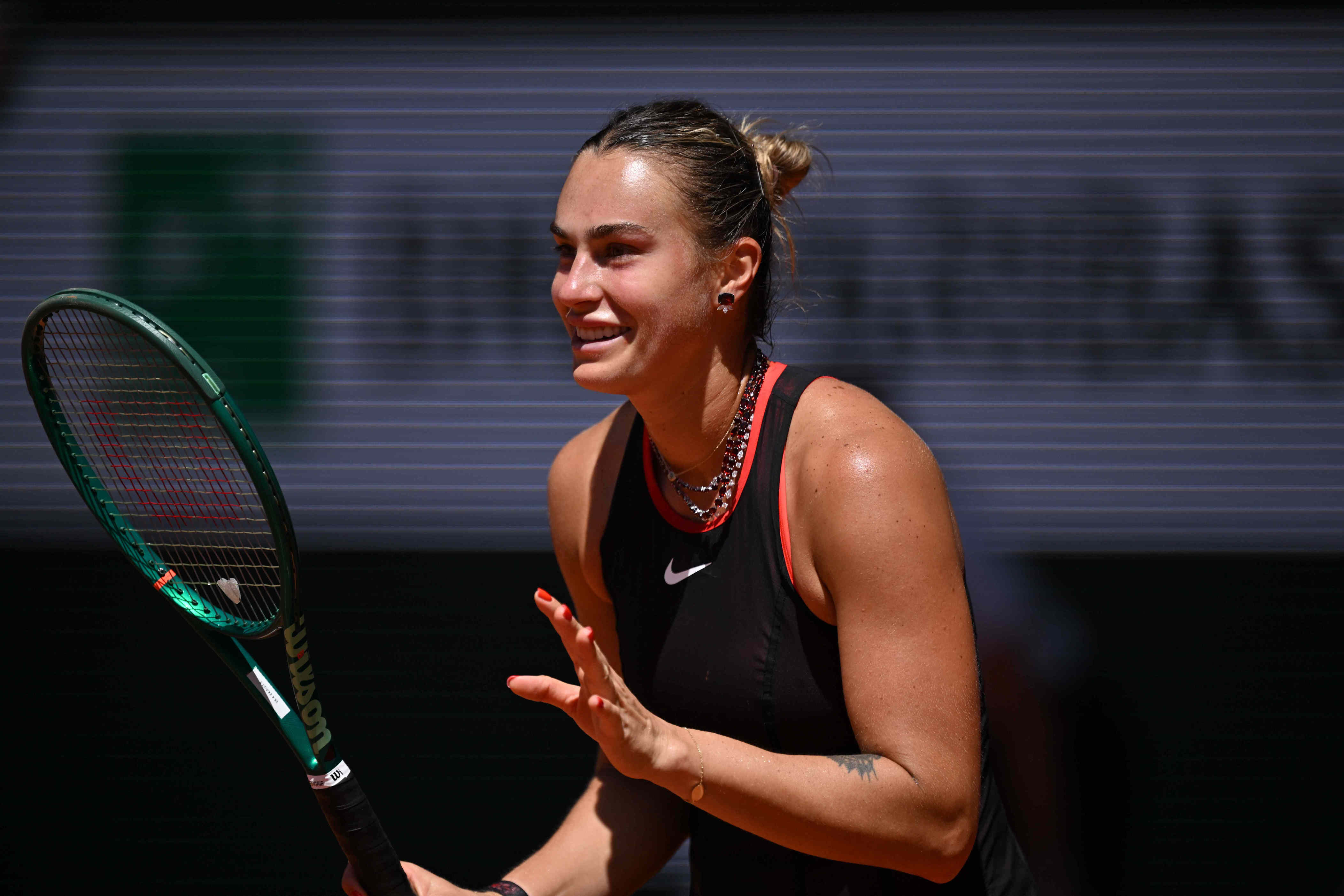 Aryna Sabalenka drips in over 200 carats of diamonds and garnets during ...