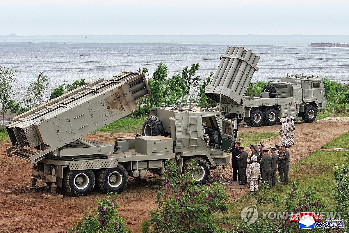 NK test of new lightweight missile launcher, cruise missiles