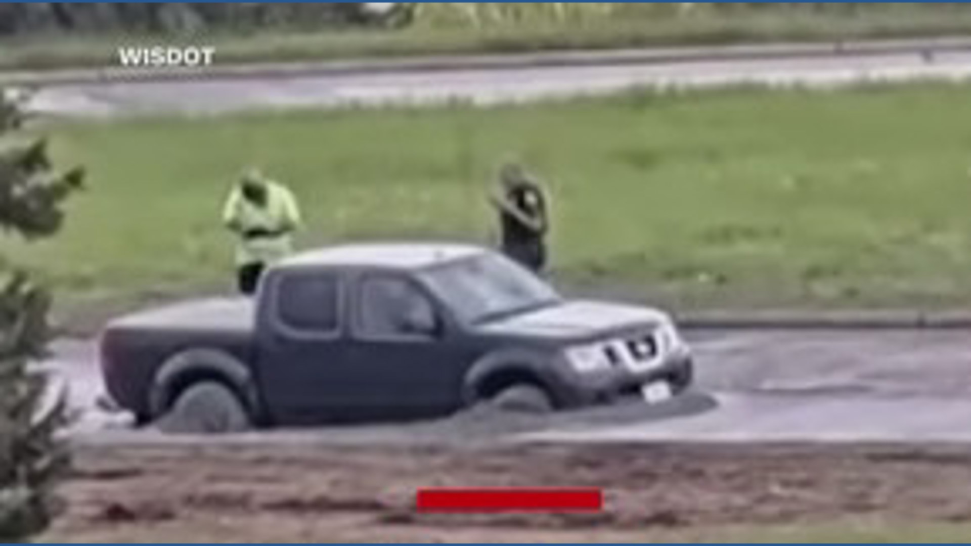 Truck gets stuck in wet concrete after driver moves 'Road Closed' sign