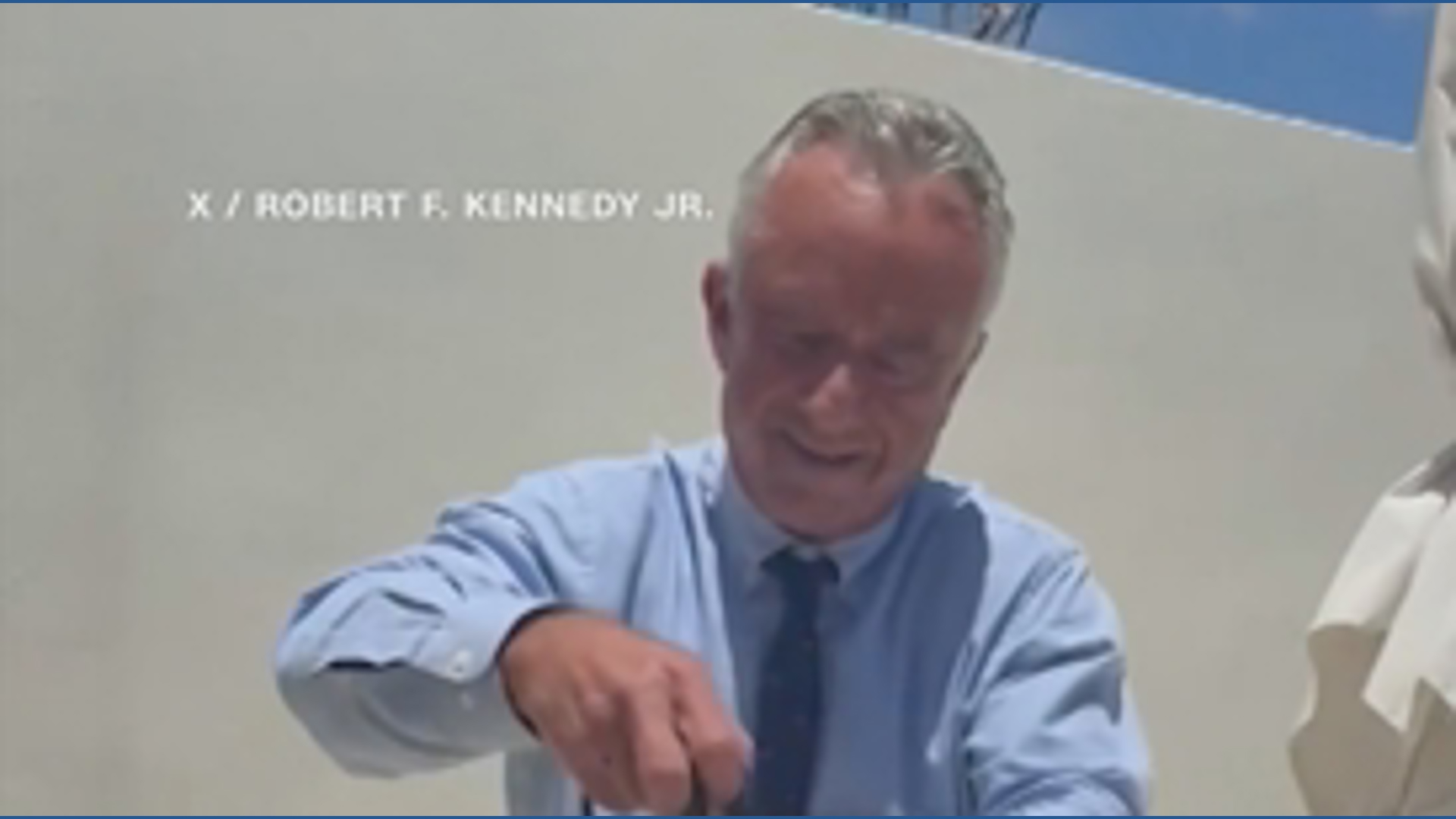 RFK Jr. wrangles two snakes with bare hands