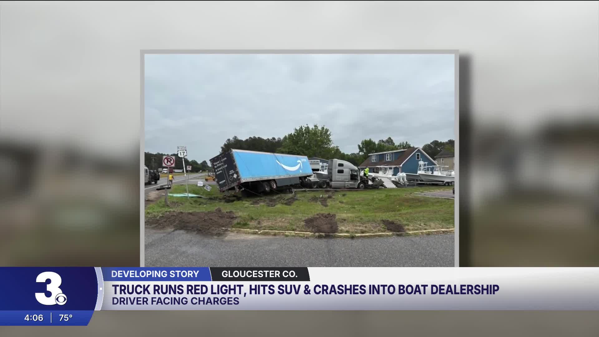 Tractor-trailer runs red light, hits car before striking nearby boats: VSP