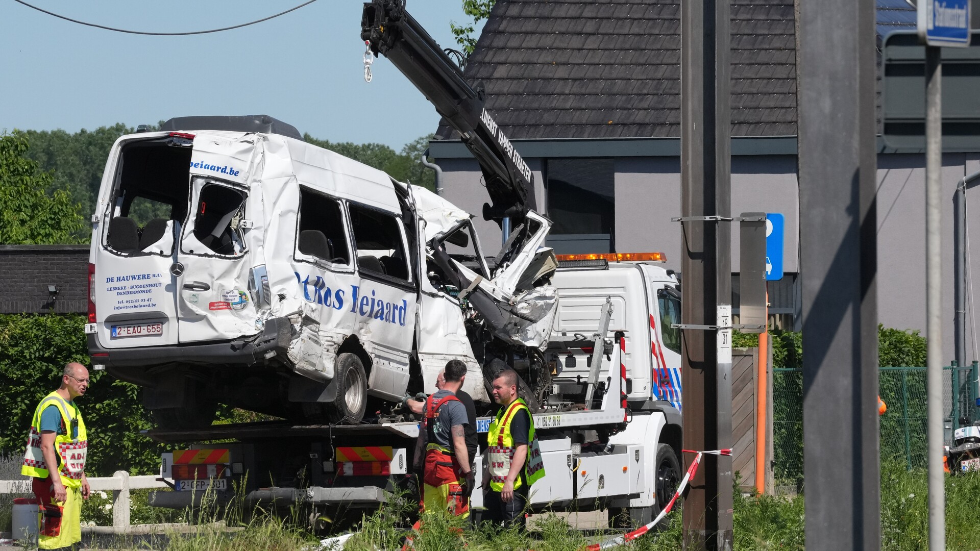 Four dead after school minivan and train collide in Belgium