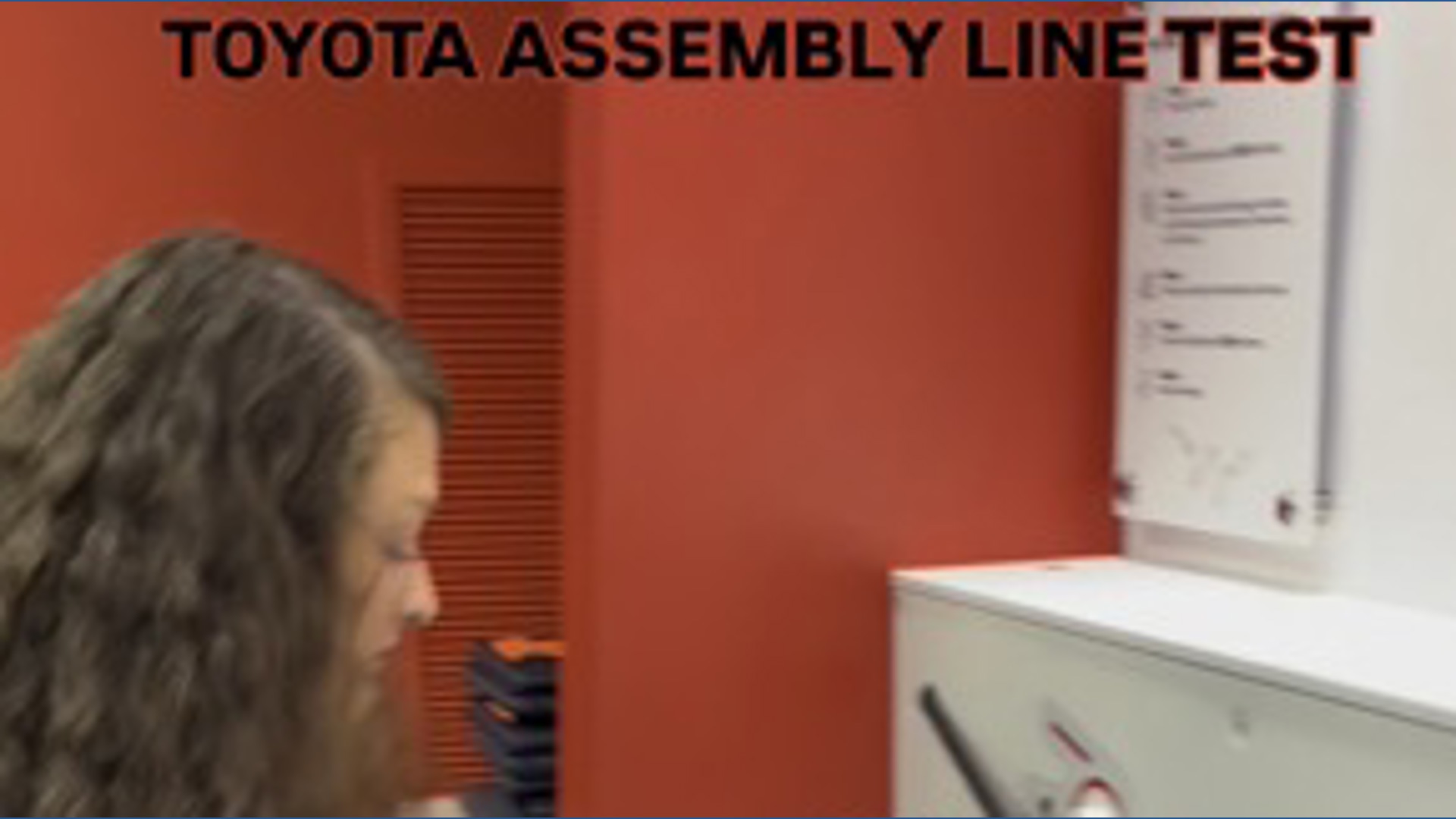 Nixon Norman attempts Toyota assembly line hand-eye coordination test