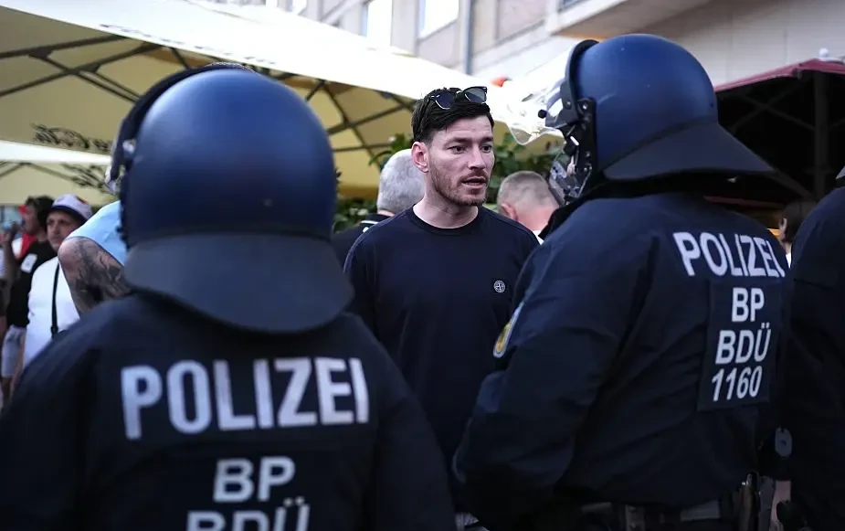 Riot police detain fans after Leipzig pre-final clashes
