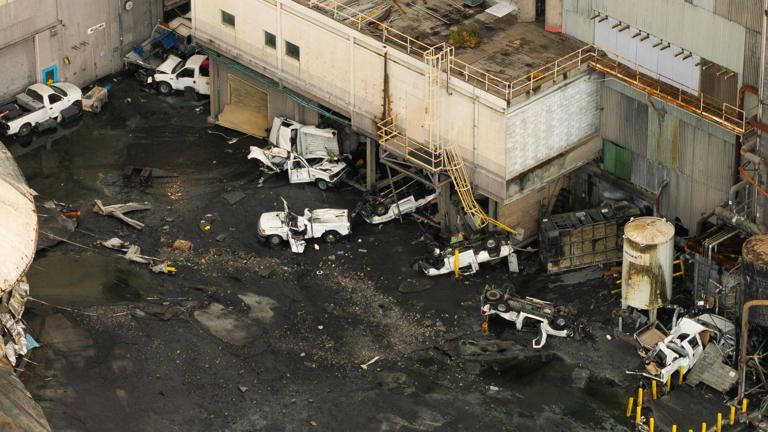 Remains of six workers found after chemical tank implosion