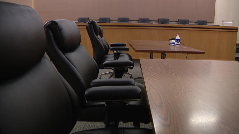 Critics say WA is neglecting to fund public defenders amid caseload cut