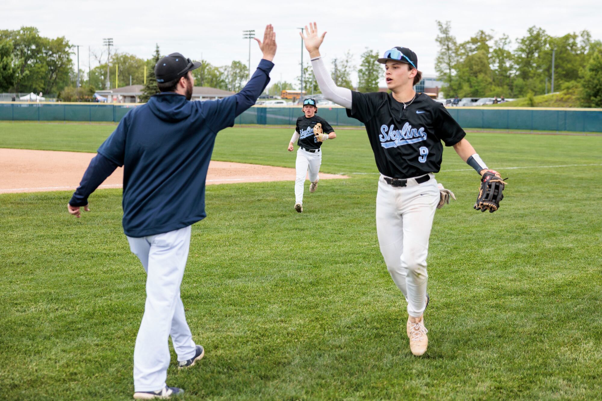 Rivalry upset headlines Ann Arbor-area baseball district opening highlights