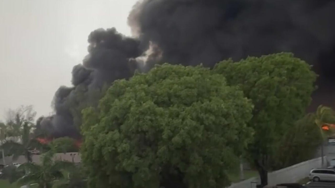 Crews monitoring hot spots after Opa Locka junkyard fire