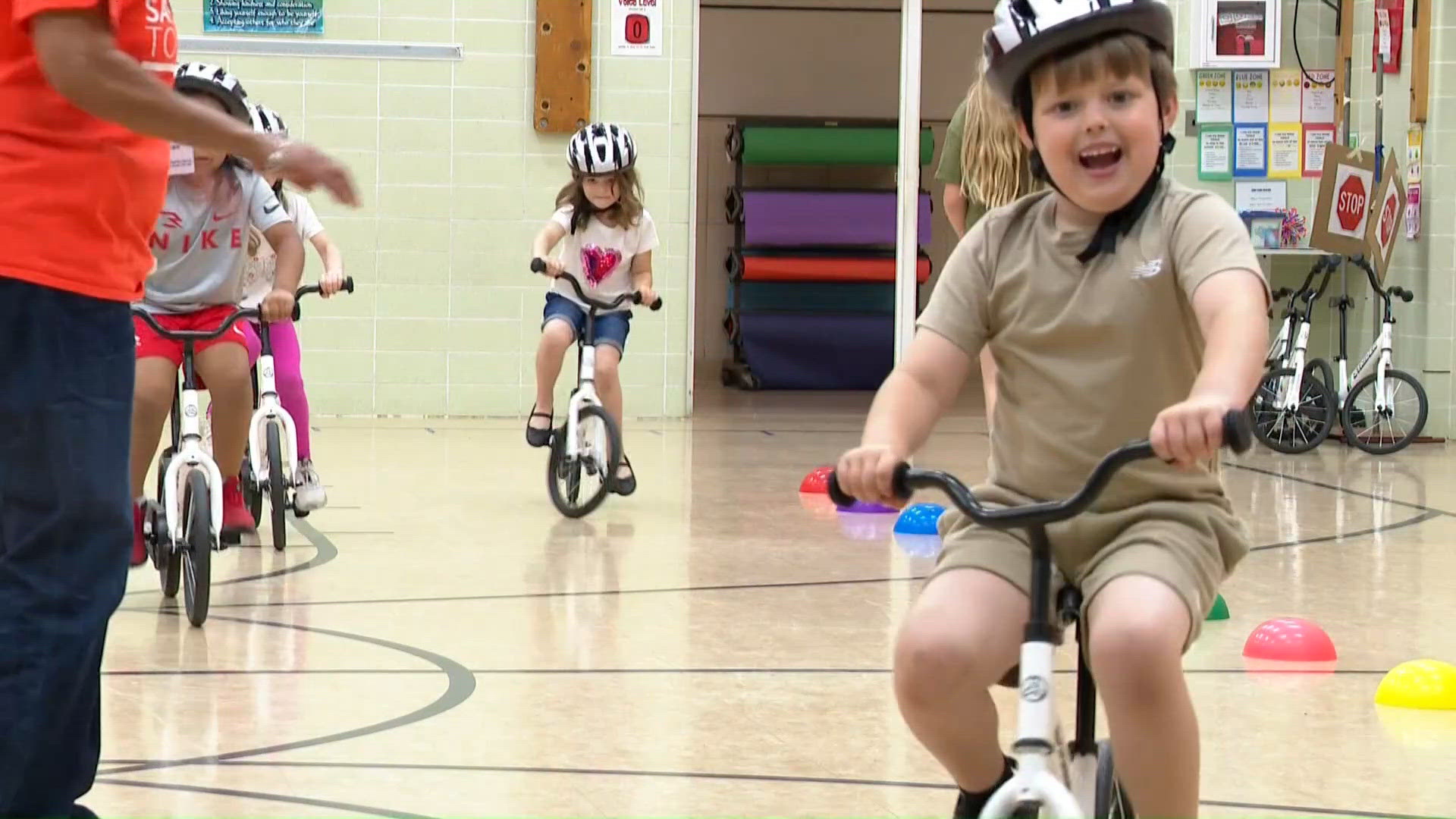 Students at Greenwood Elementary learn how to ride bikes in class