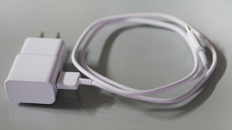 Do phone chargers use electricity when not in use?