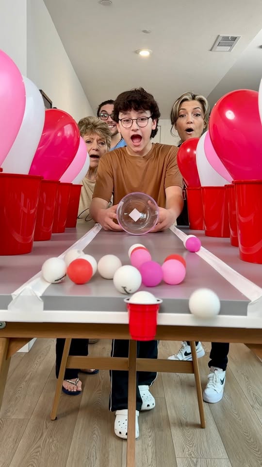 Family ping pong hearts game full of love