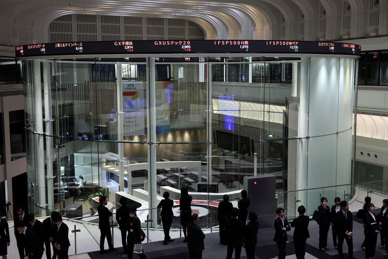 Japan's Nikkei retreats from record high as AI rally sparks caution