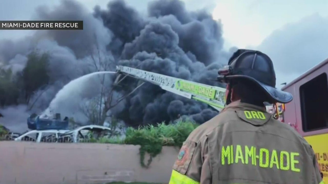 Fire crews monitoring hot spots in Opa Locka junk yard fire as ...