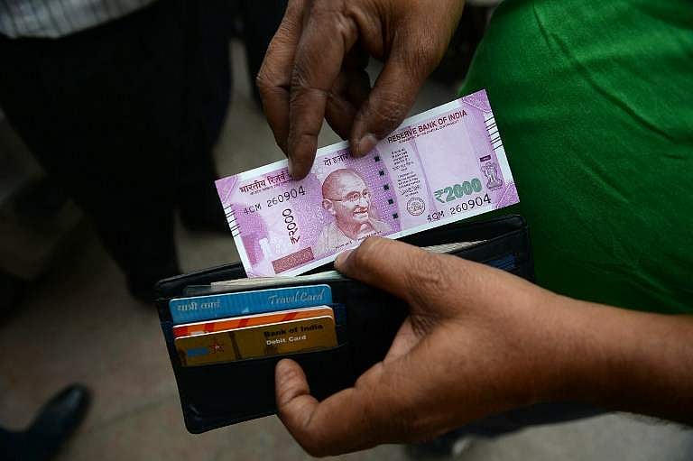 Rupee slips 8 paise to 95.78 against US dollar in early trade