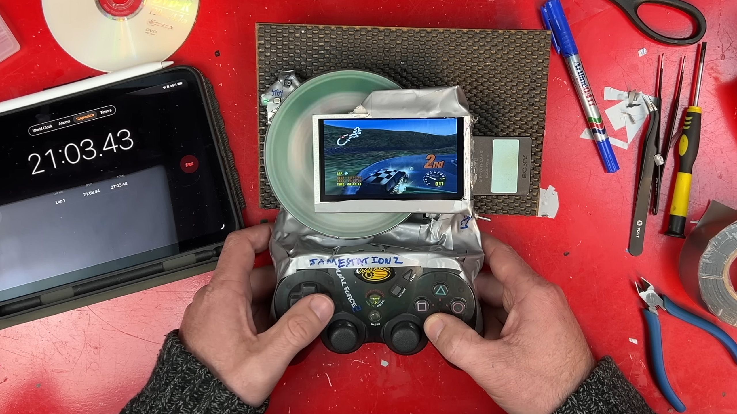This wild PS2 handheld has a buzz saw-like disc drive — and somehow it ...