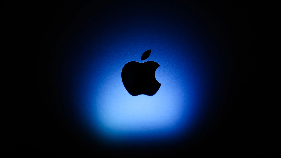 Apple hits record $311 as AI strategy gains traction