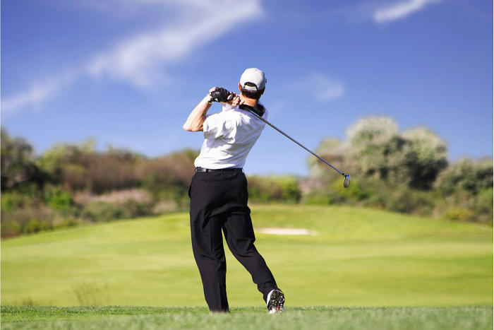 Walking the fairways with golfing god