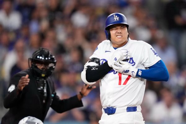 Dodgers' Shohei Ohtani still set to start after hand hit by pitch