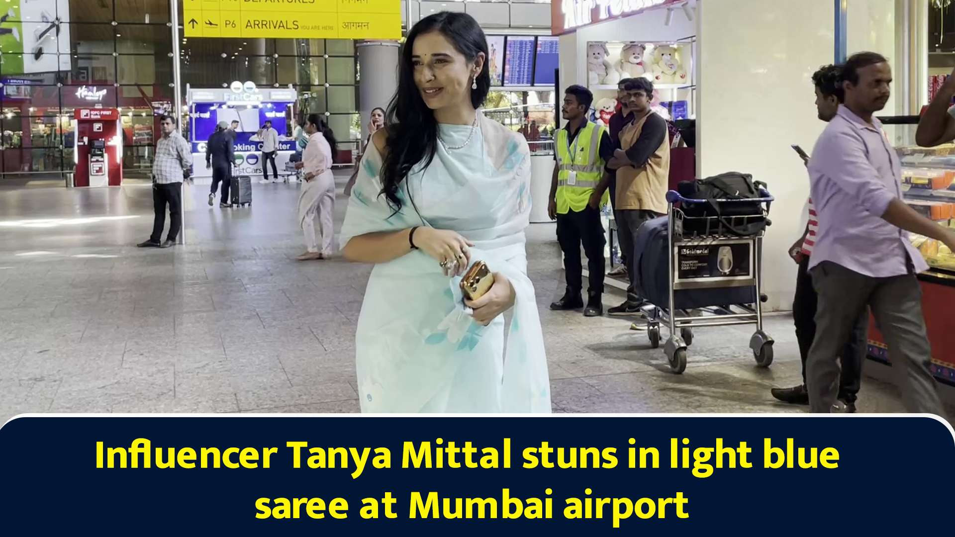 Influencer Tanya Mittal stuns in light blue saree at Mumbai airport
