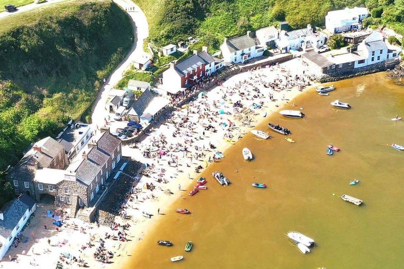 Swimmers alarmed as sea turns brown at Welsh beach