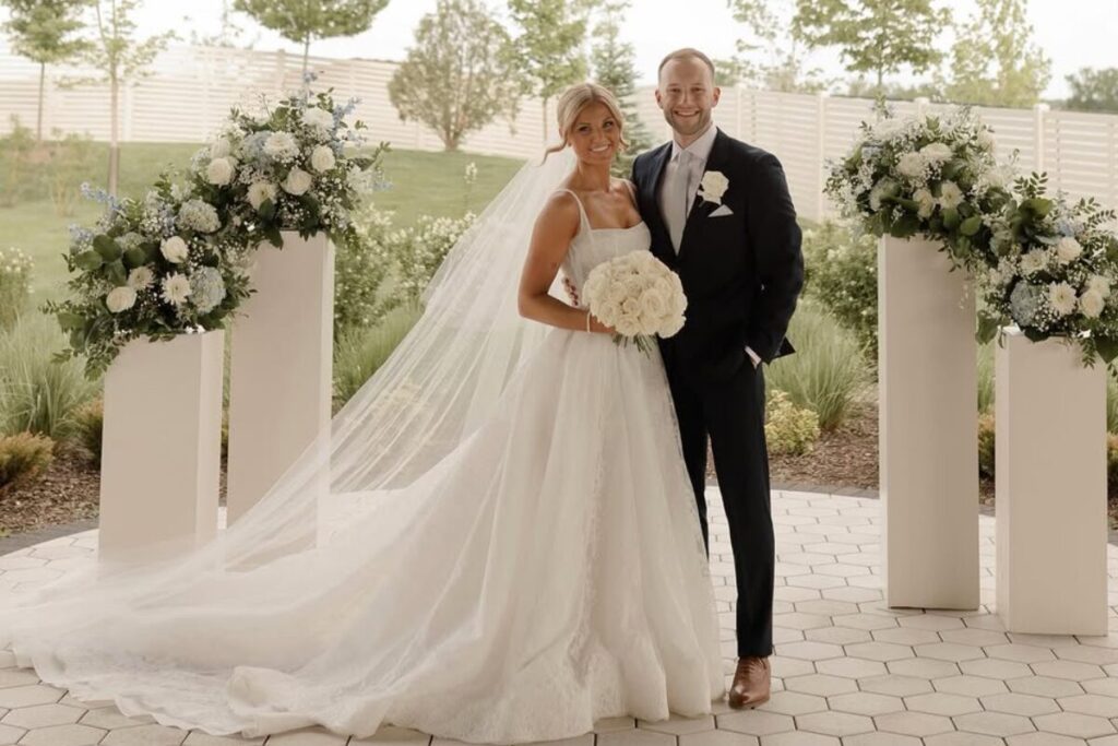 Cowboys cheerleader ties knot with partner of 10 years in Iowa
