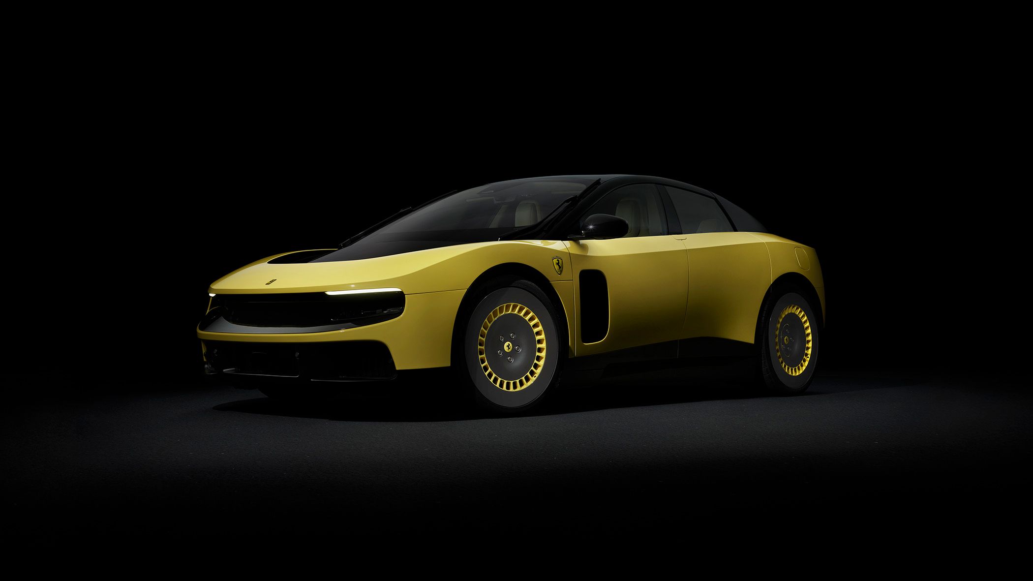 Ferrari unveils its first EV—with a polarizing design from a former ...