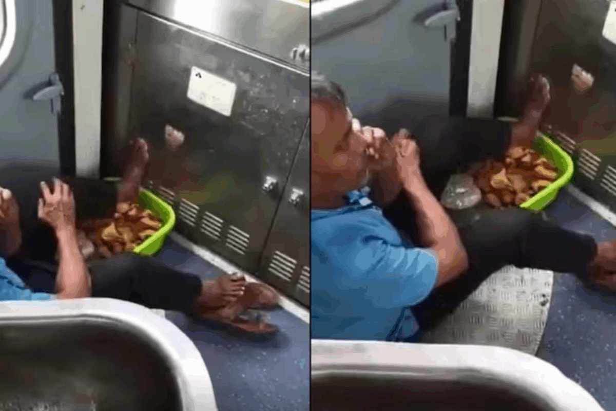 Railway vendor seen resting feet on samosa basket in moving train ...