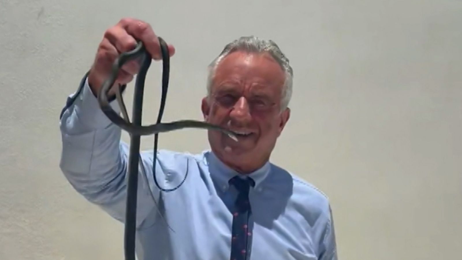 What's Trump's health secretary doing with snakes?