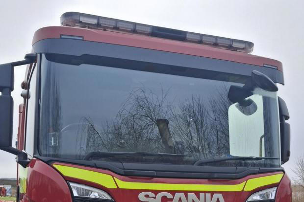 Firefighters rescue woman trapped in vehicle after crash near East ...