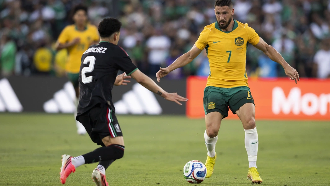 Popovic names bold young Socceroos squad for World Cup