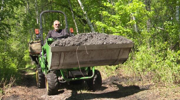 Volunteers work to improve Rutland Rail Trail for ATV season