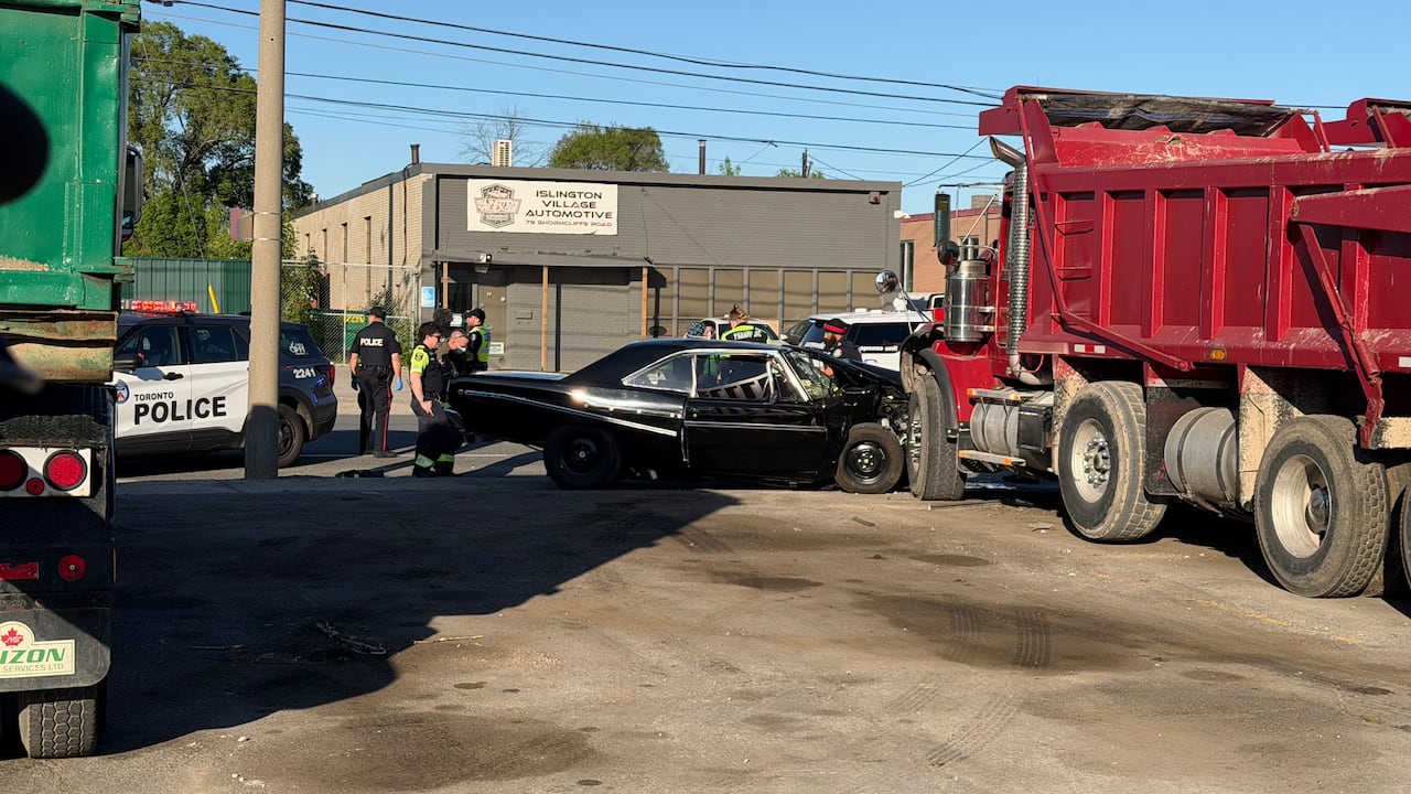 Driver dead after car collides with parked truck in Etobicoke, police say