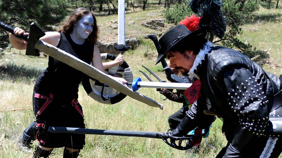 What does the slang term "LARP" mean?