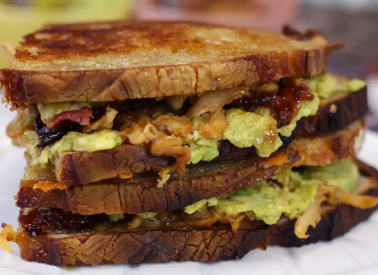 Maxi grilled cheese sandwich: cheddar, shredded chicken, avocado, bacon