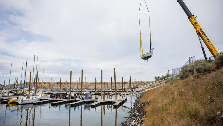 Photo gallery: 'Crane Day' no fun as sailboat lifted from Great Salt ...
