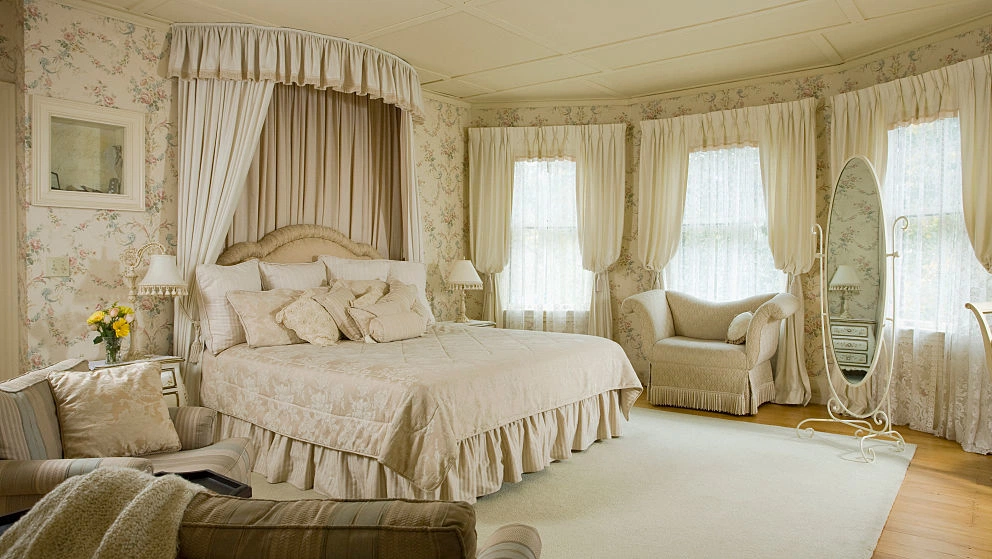 Designers predict warm, cocoon-like bedrooms will define 2026