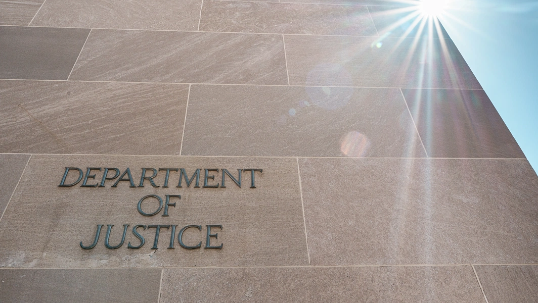 Trump halts $1.8B fund as judge backs protest banner