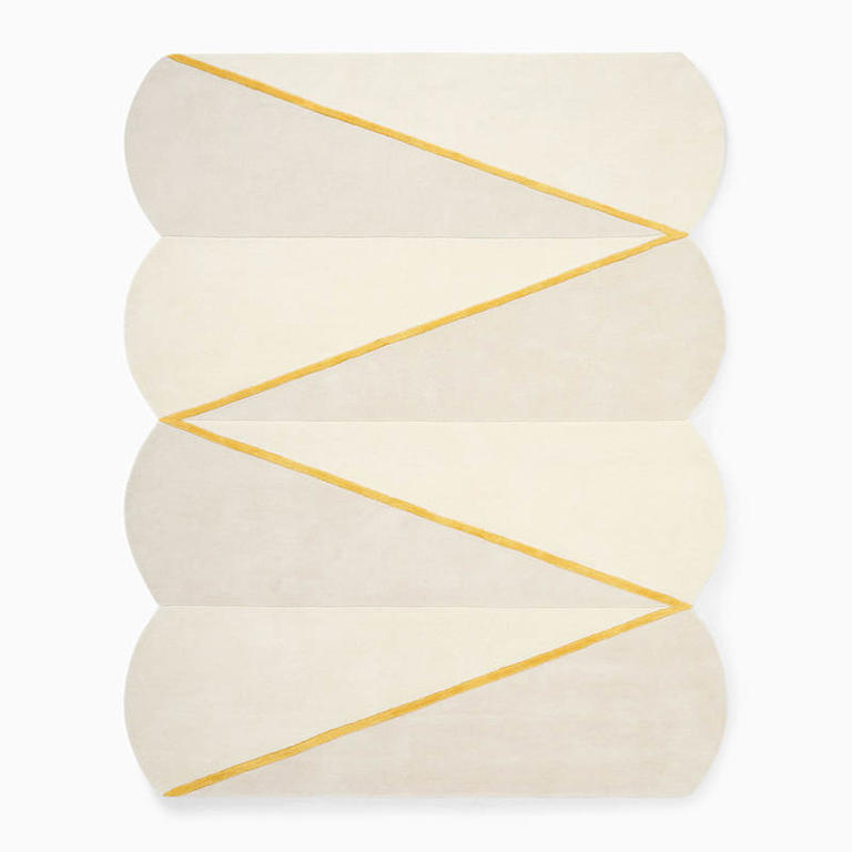 I never thought I'd put a rug on my wall - until I saw this DIY hack