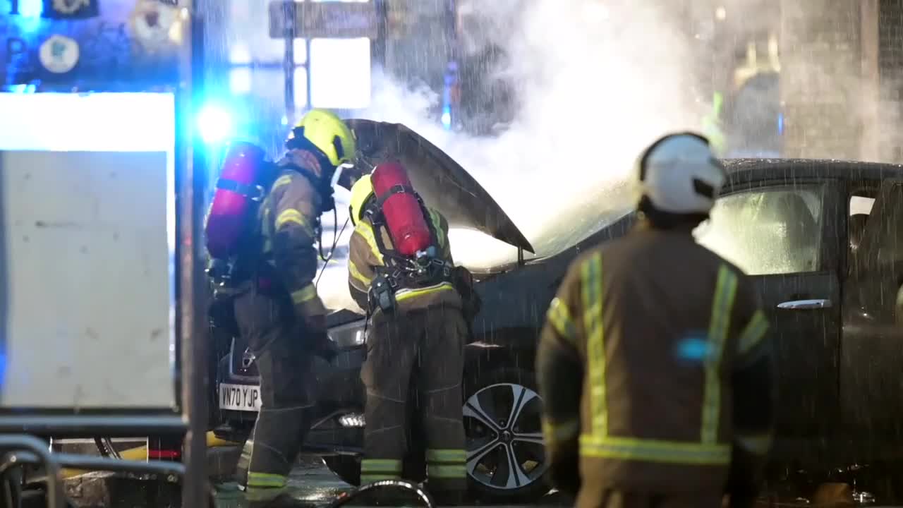 Electric vehicle fire sparks major emergency response and closes busy ...