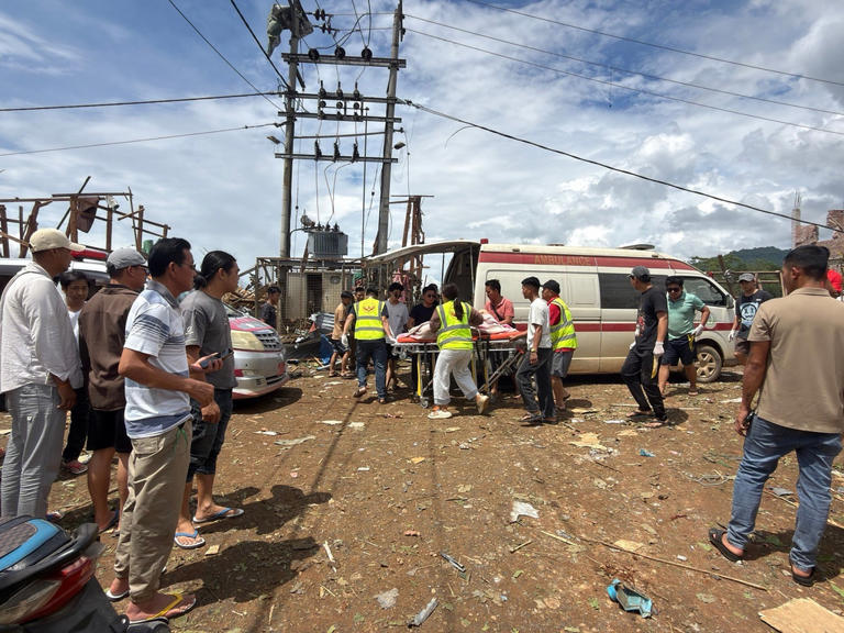 Rescuers dig for bodies after a mining explosives blast in Myanmar ...