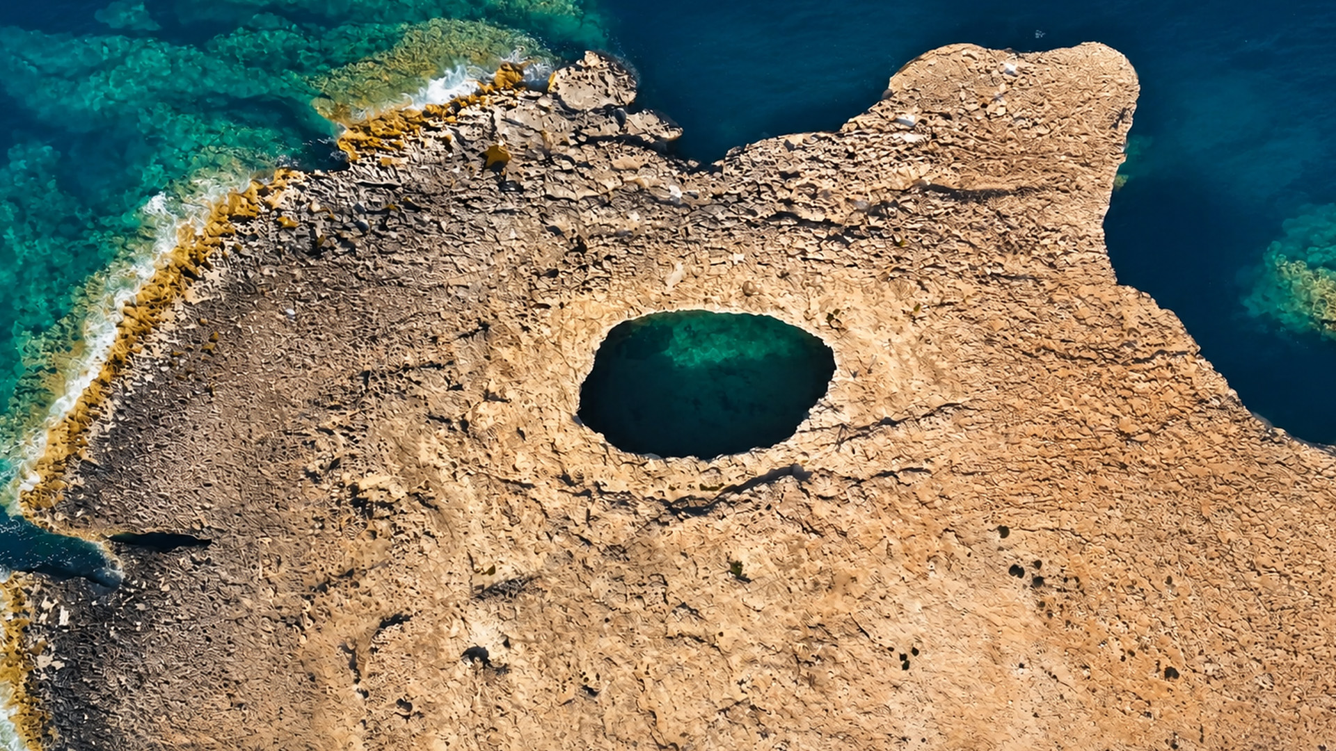 How did this giant hole form in the rock?