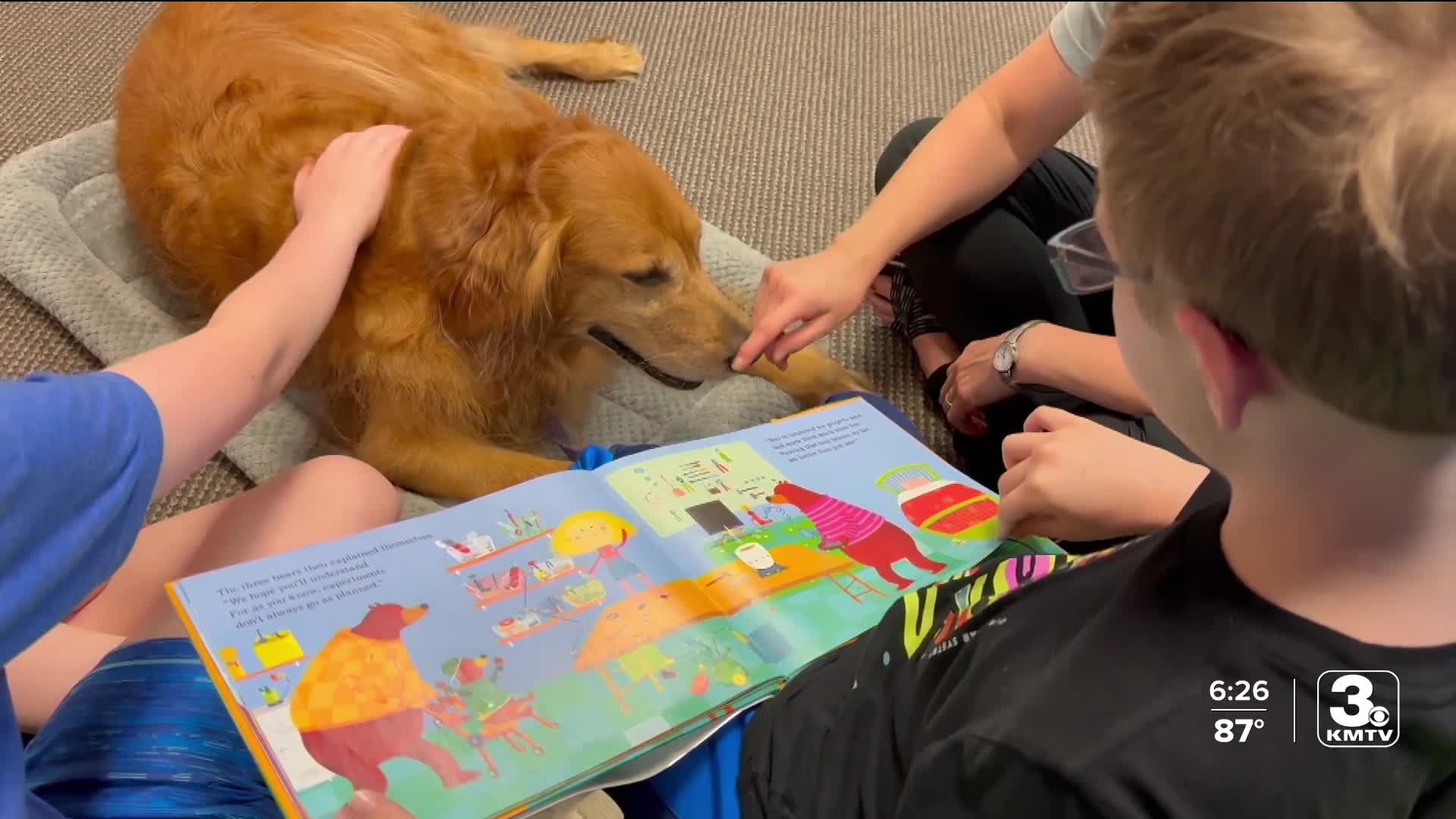 Millard Library's read-to-a-dog program helps kids build reading ...