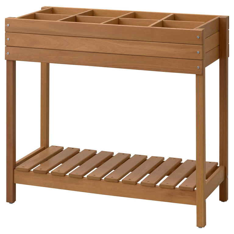 This stylish IKEA plant stand doubles as a raised bed planter