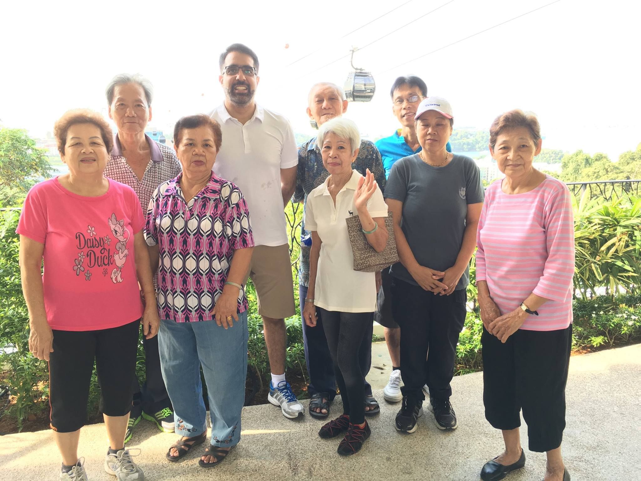 Pritam Singh greets Tan See Leng, grassroots adviser, at Eunos hawker ...